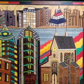 "Skyline East" is a marquetry art piece by artist, Errol Bruce
